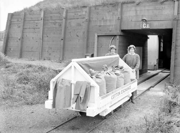 Worker with wagon, HM Factory Gretna, 1918 | ScotlandsPeople