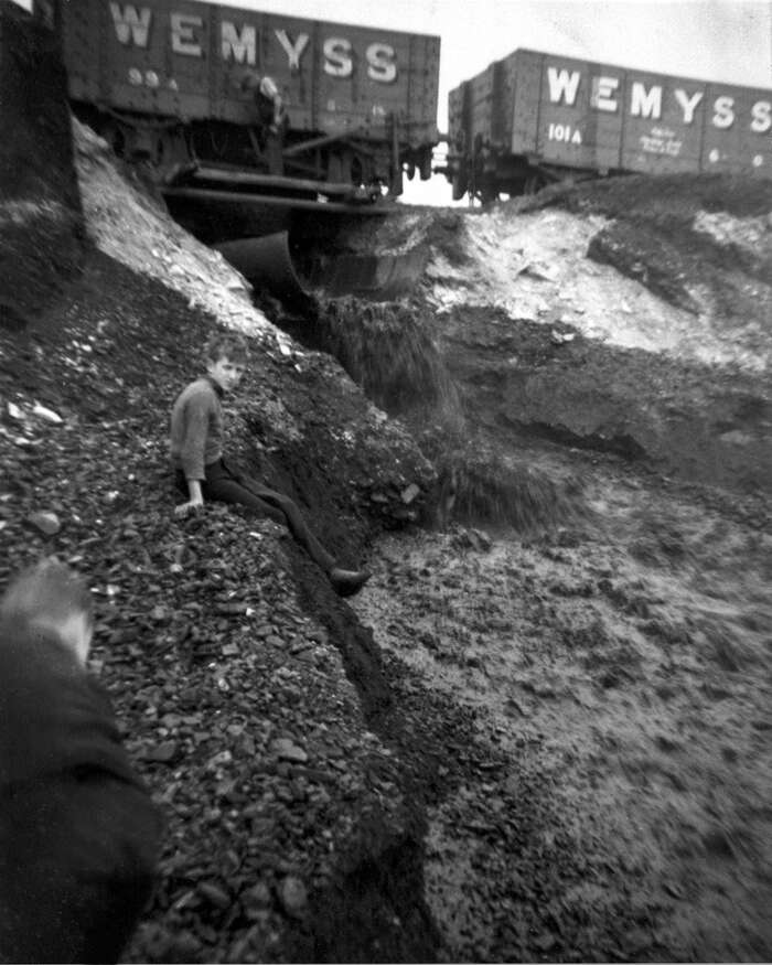 Boy on coal bing, Fife, 1935 | ScotlandsPeople