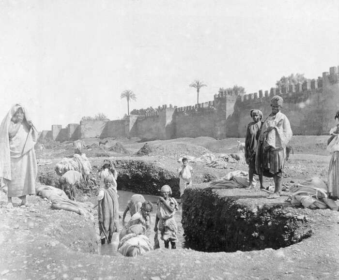 Washing by Marrakech walls, c 1890 | ScotlandsPeople