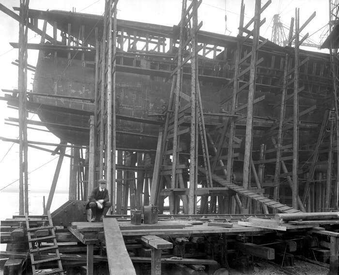 Stern of HMS Tiger under construction on the slip way | ScotlandsPeople
